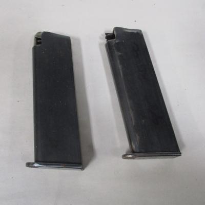 Pair Of Magazine Clips | EstateSales.org