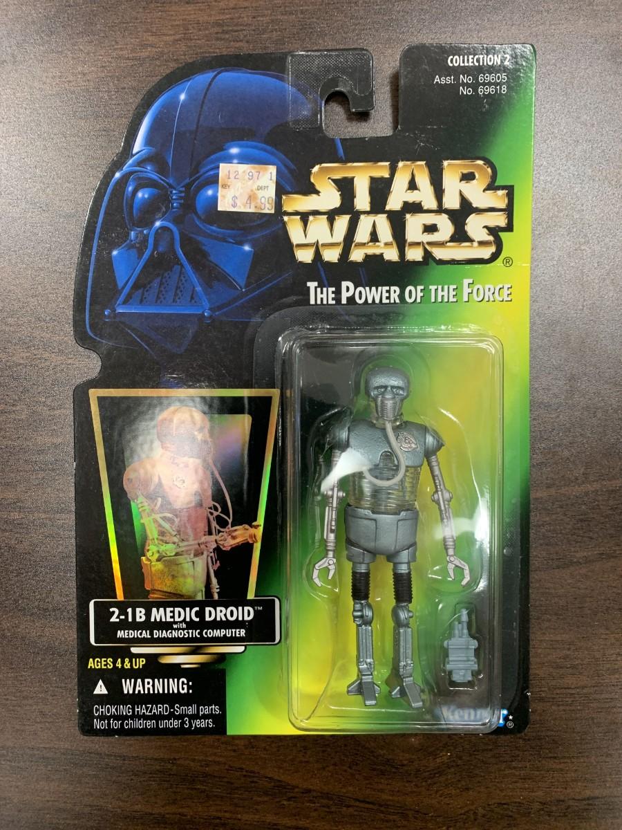 Star Wars unsigned 2-1B action figure | EstateSales.org
