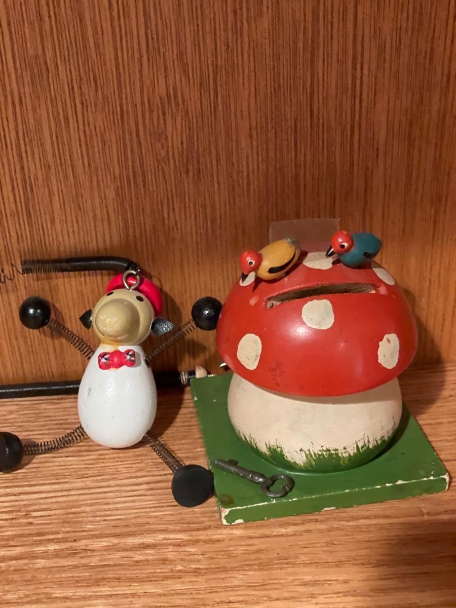 Small wood mushroom bank and hanging wood creature | EstateSales.org