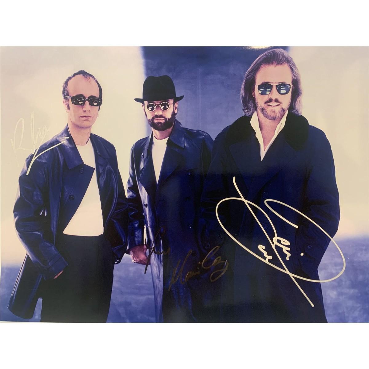 The BeeGees signed photo. GFA Authenticated | EstateSales.org