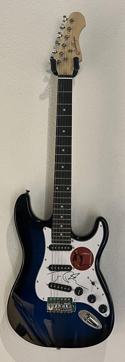 Tom Petty signed blue sunburst strat style guitar | EstateSales.org