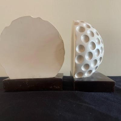 Pair of Resin Golf Ball Bookends | EstateSales.org