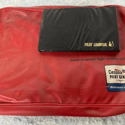 1977 pilot logbook & Cessna bag | EstateSales.org