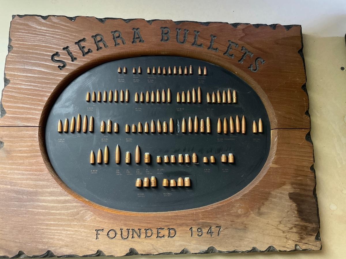 Sierra bullets on wood board | EstateSales.org