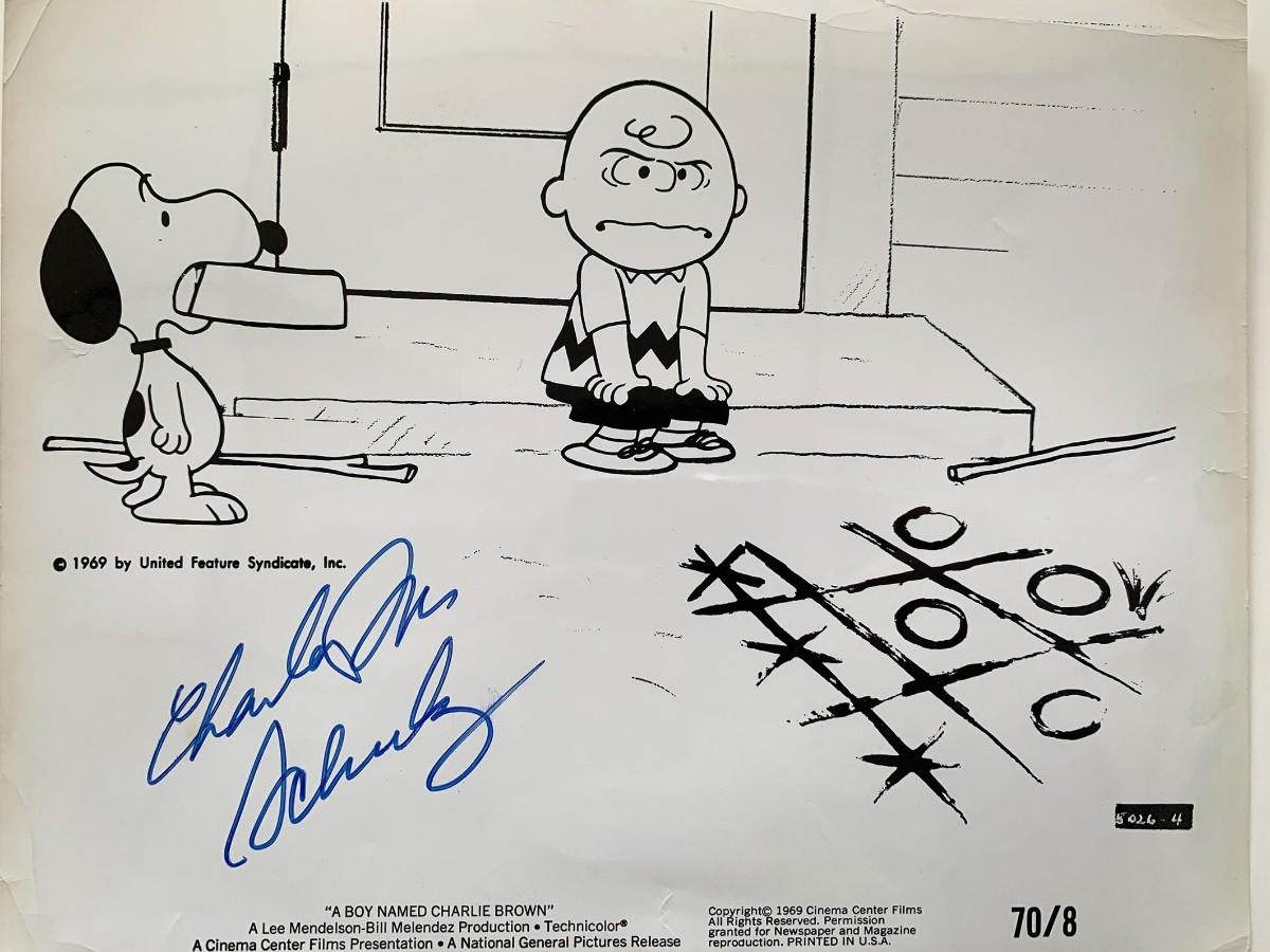A Boy Named Charlie Brown Chales M. Schulz signed photo | EstateSales.org
