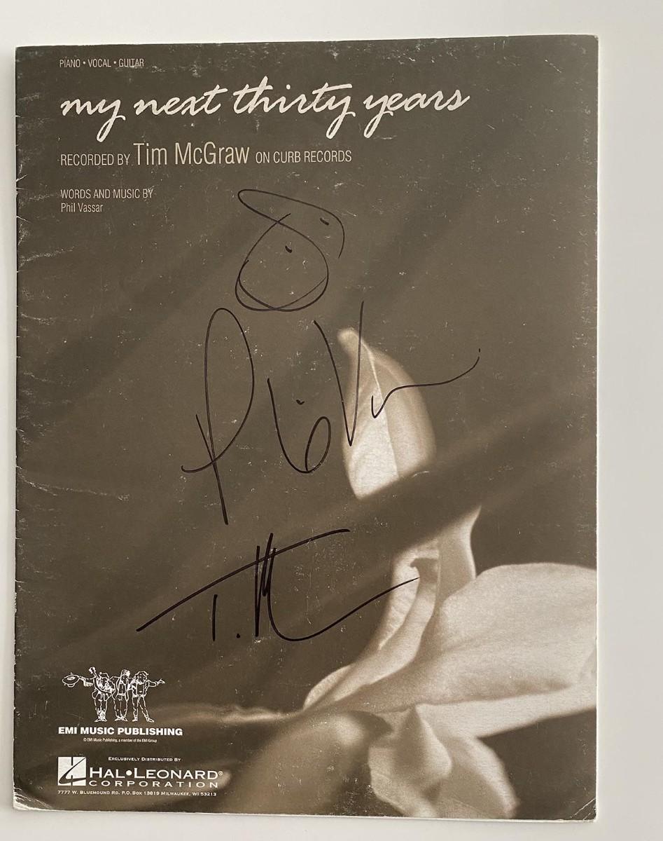 Tim McGraw and Phil Vassar signed sheet music | EstateSales.org