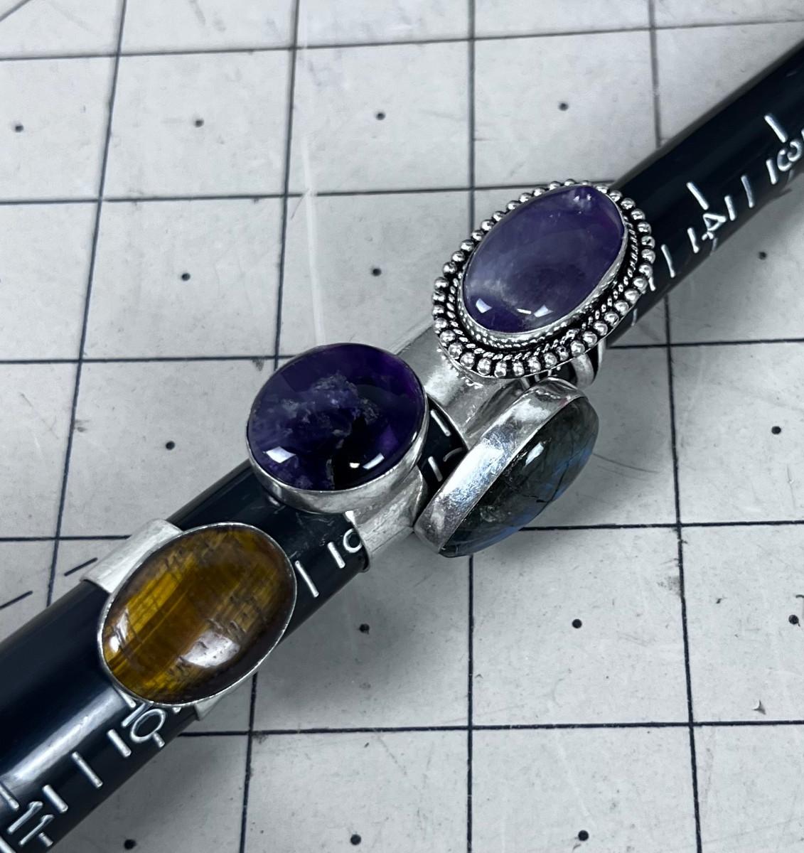 4 Rings Blue, Purple, Brown Laborite | EstateSales.org