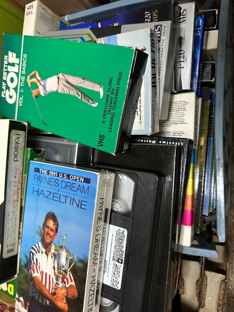 large collection of golf VHS tapes | EstateSales.org