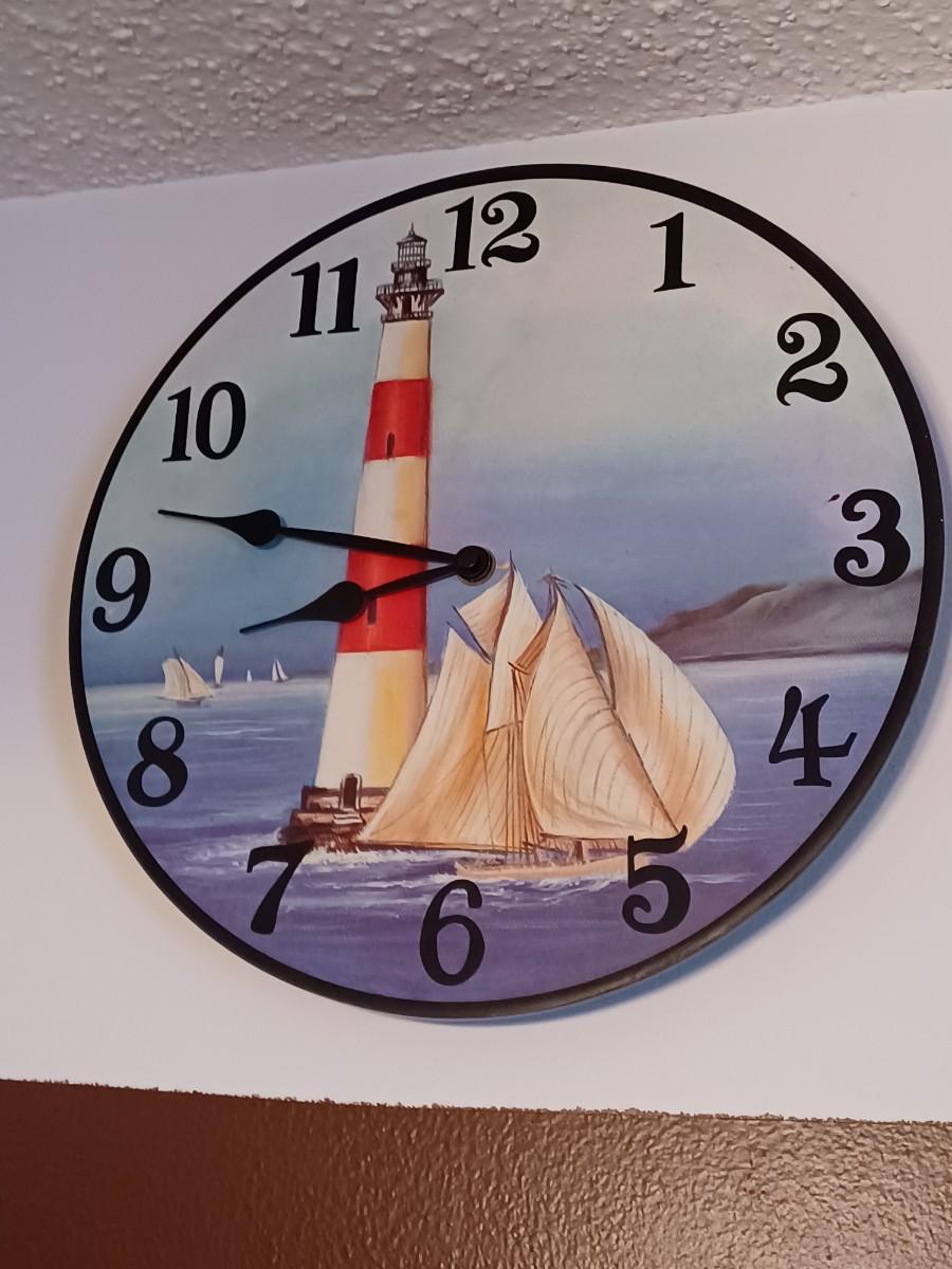 Lighthouse clock | EstateSales.org
