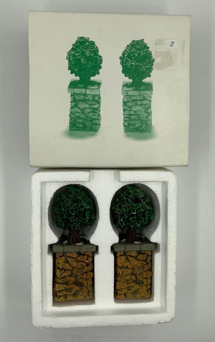 Stone Corner Posts with Holly Tree | EstateSales.org