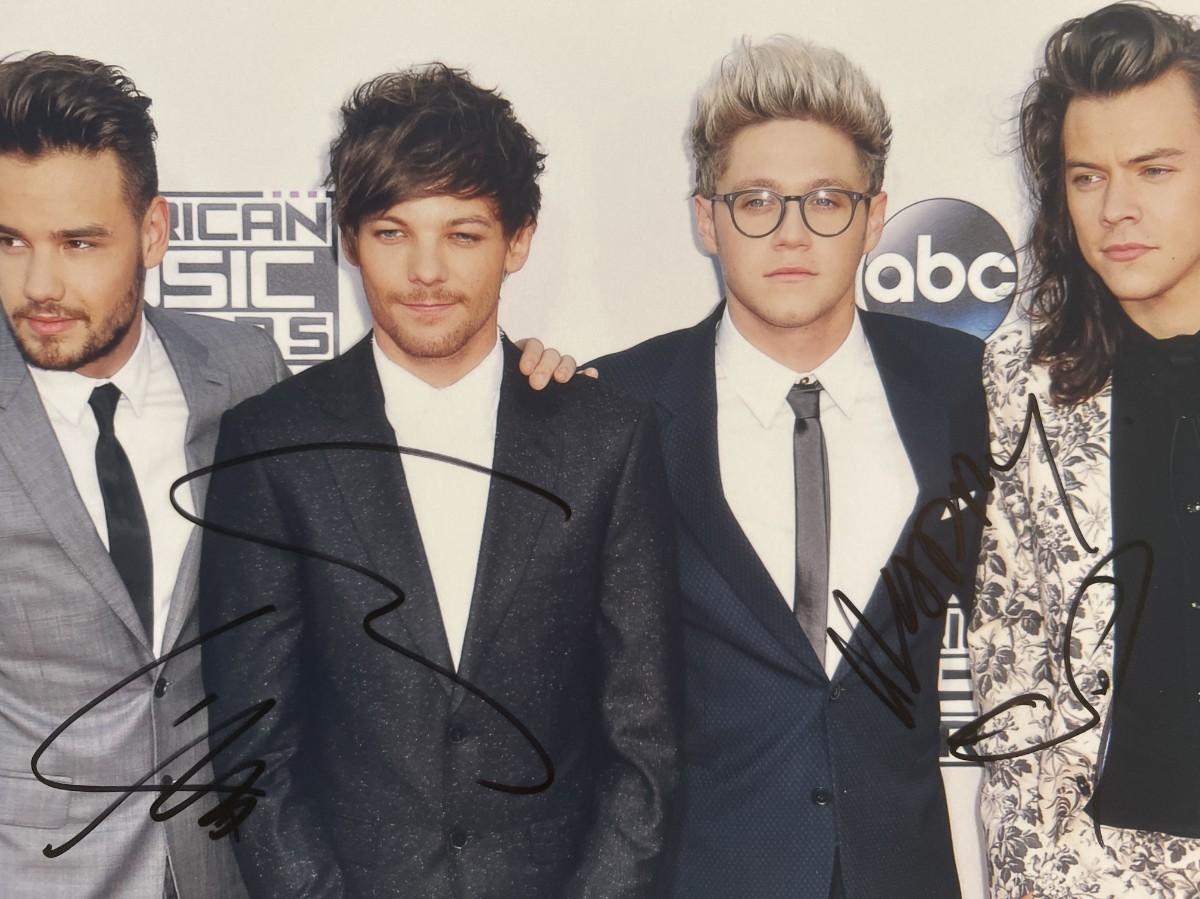 One Direction band signed photo | EstateSales.org