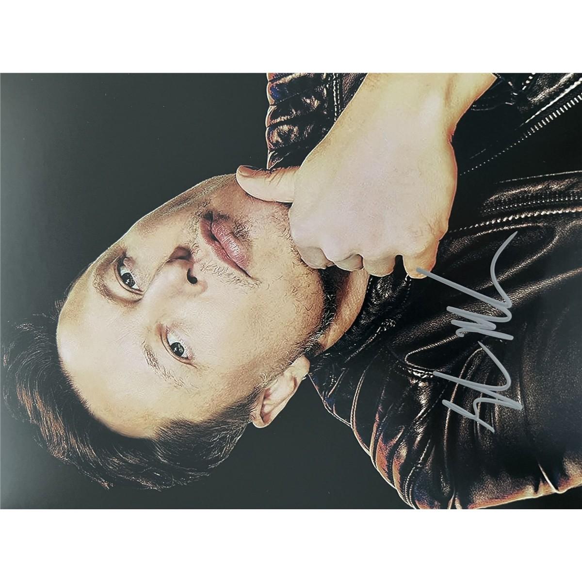 Elon Musk signed photo | EstateSales.org