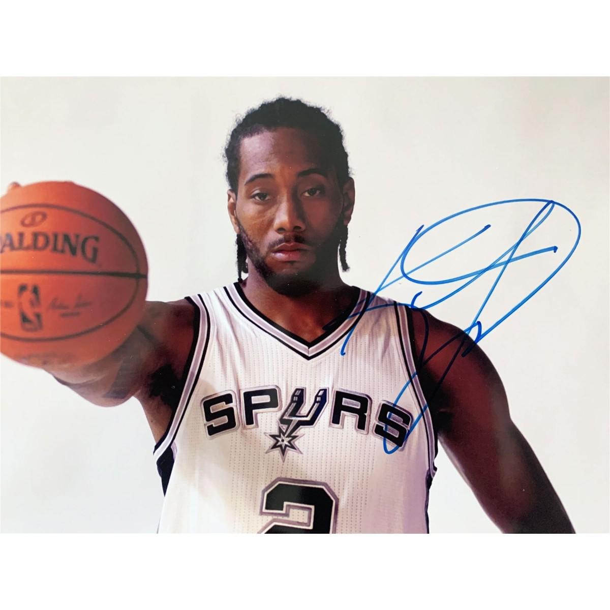 Kawhi Leonard signed photo | EstateSales.org