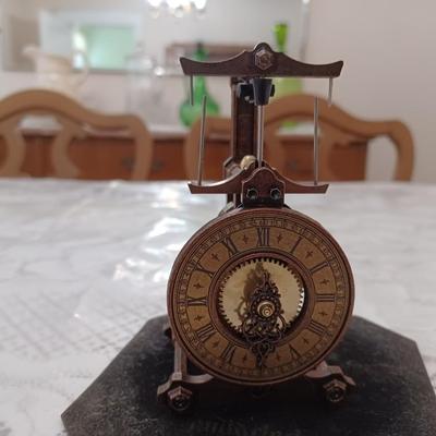 Guild Clock Flying Pendulum | EstateSales.org