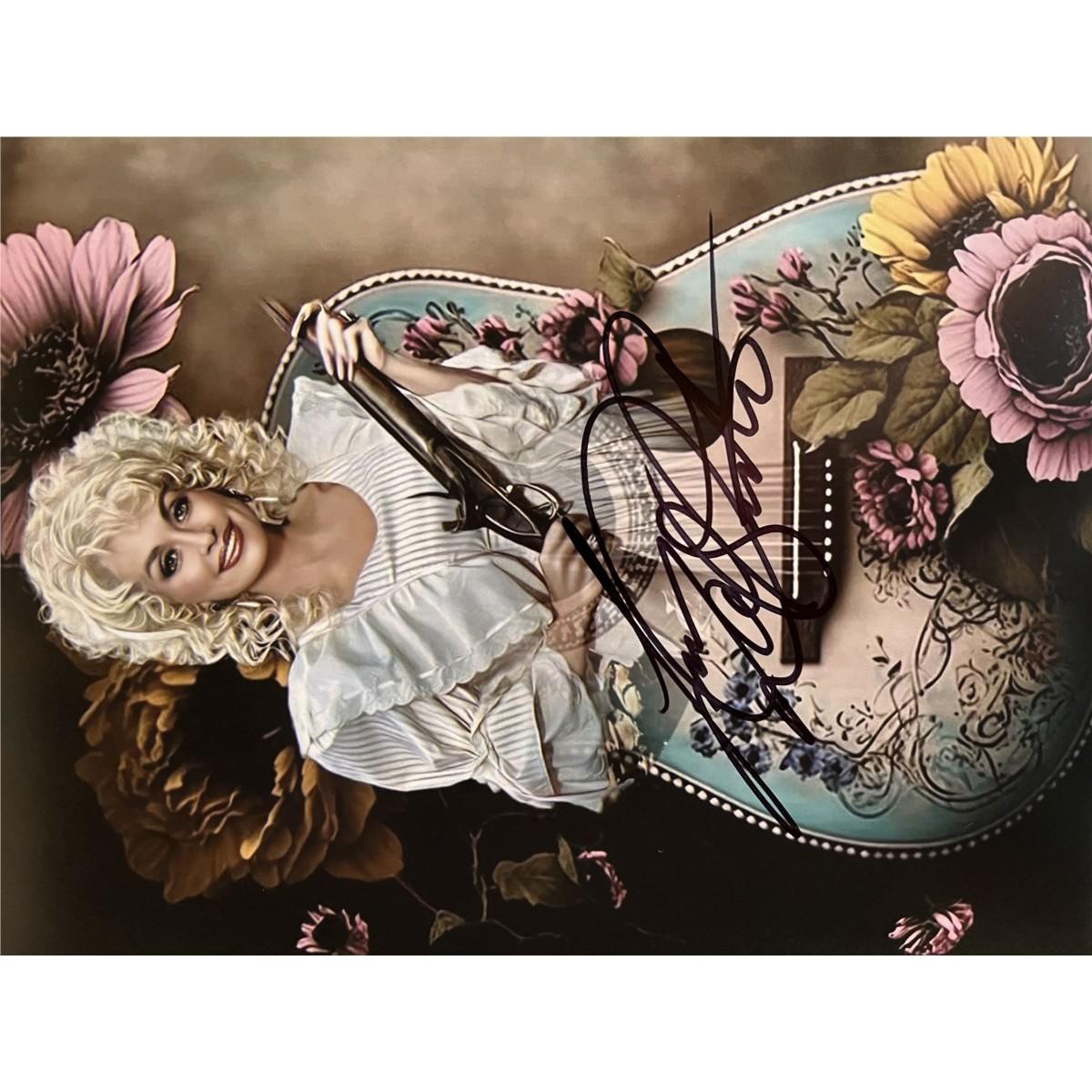 Dolly Parton signed photo | EstateSales.org