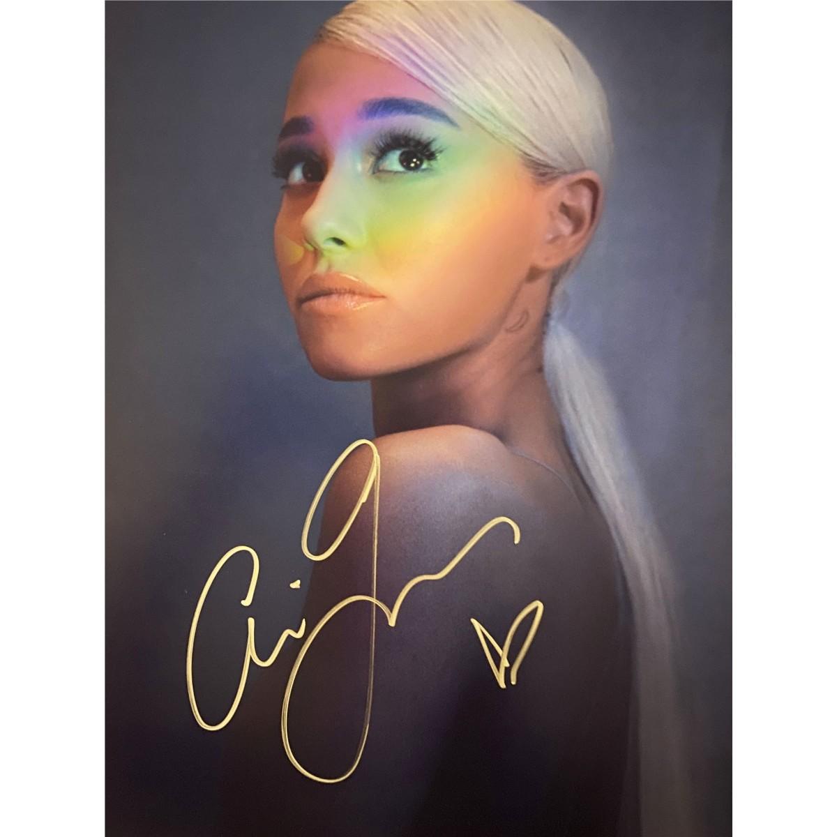 Ariana Grande signed photo | EstateSales.org