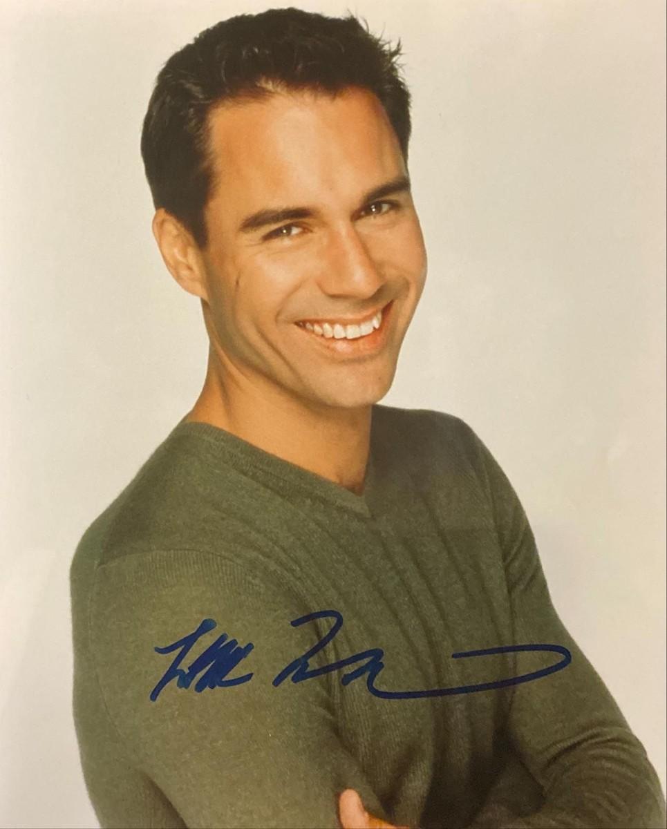 Eric McCormack Signed Photo | EstateSales.org