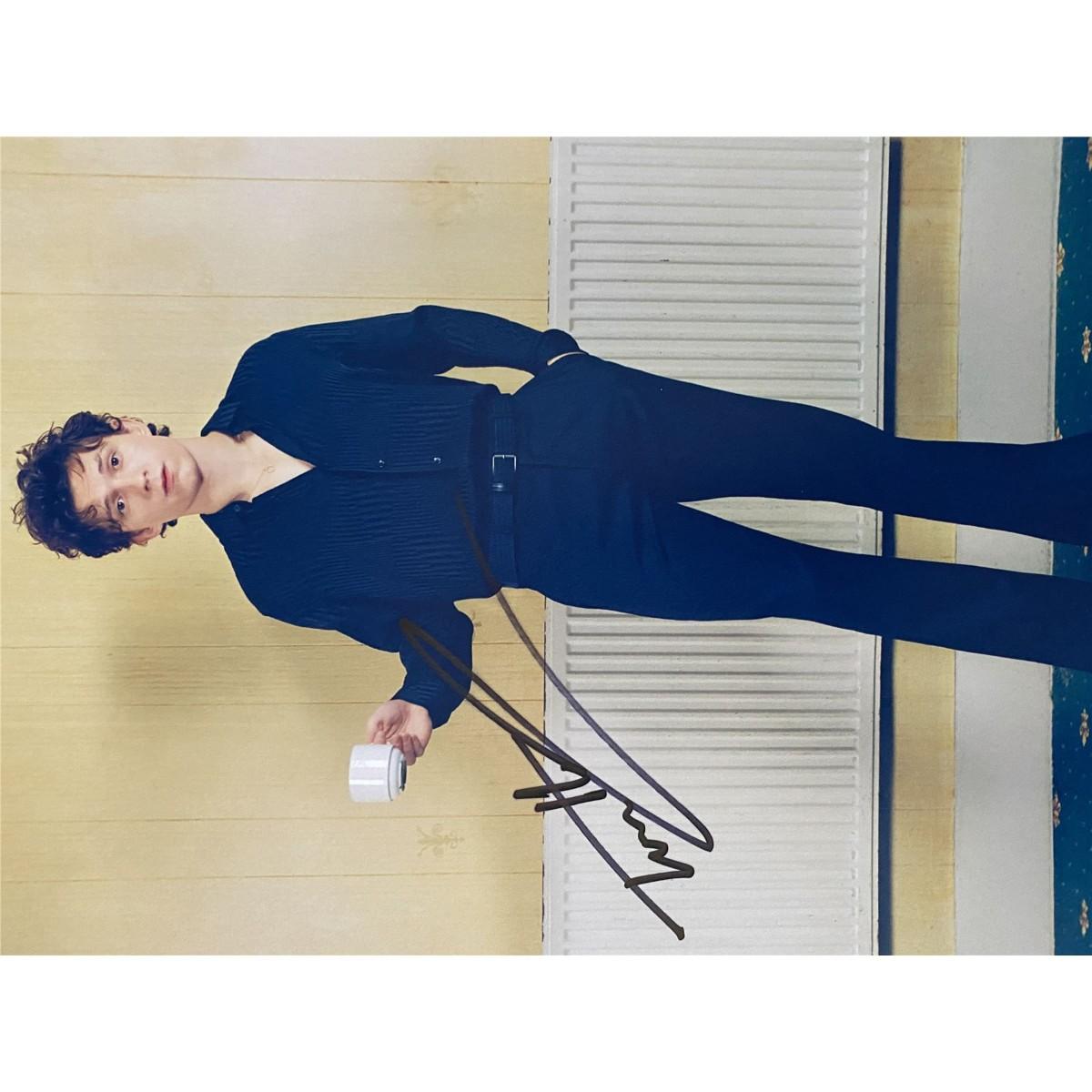 Tom Holland signed photo | EstateSales.org