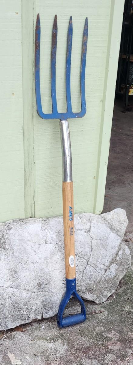 Small blue pitch fork | EstateSales.org