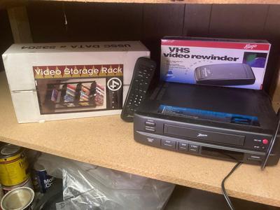 ZENITH VCR , VHS STORAGE RACK, AND VIDEO REWINDER | EstateSales.org