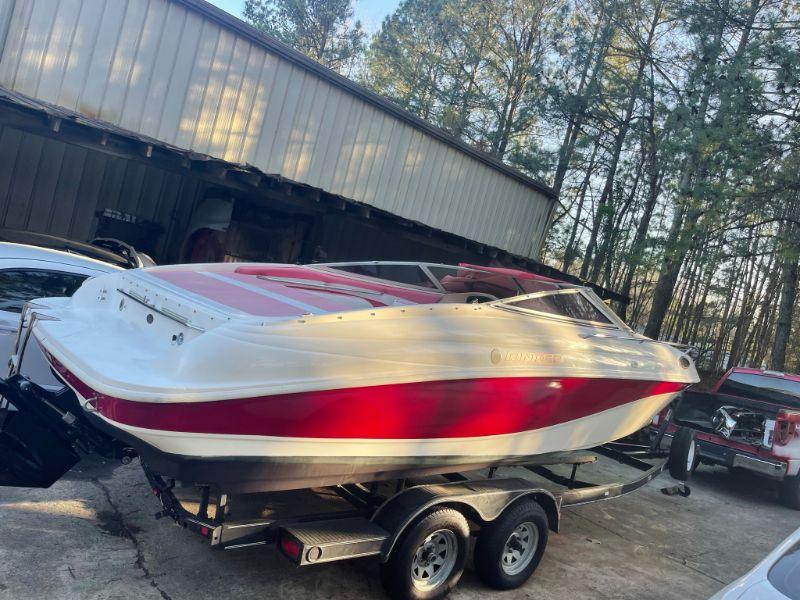 96 Rinker 230 Captiva Cuddy with Trailer | EstateSales.org